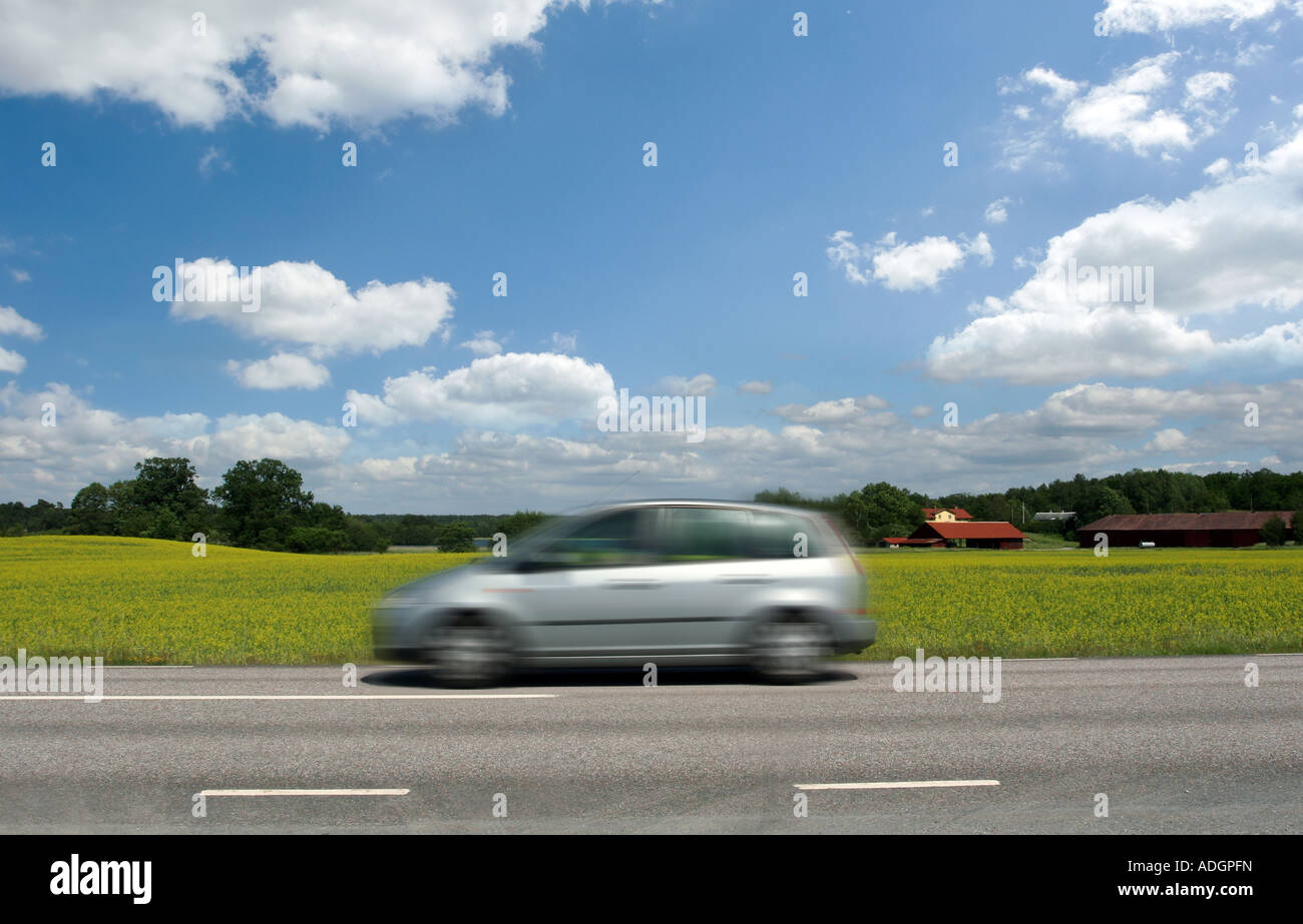 Car in motion Stock Photo - Alamy