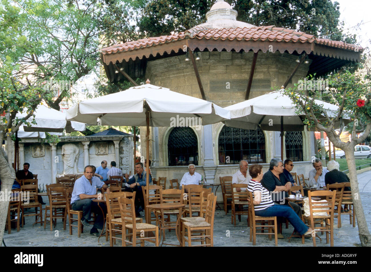 Greece Crete Iraklion Bembo Fountain Old Turkish kiosk cafe people ...