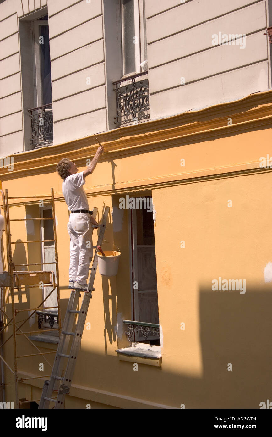 Man painting building hi-res stock photography and images - Alamy