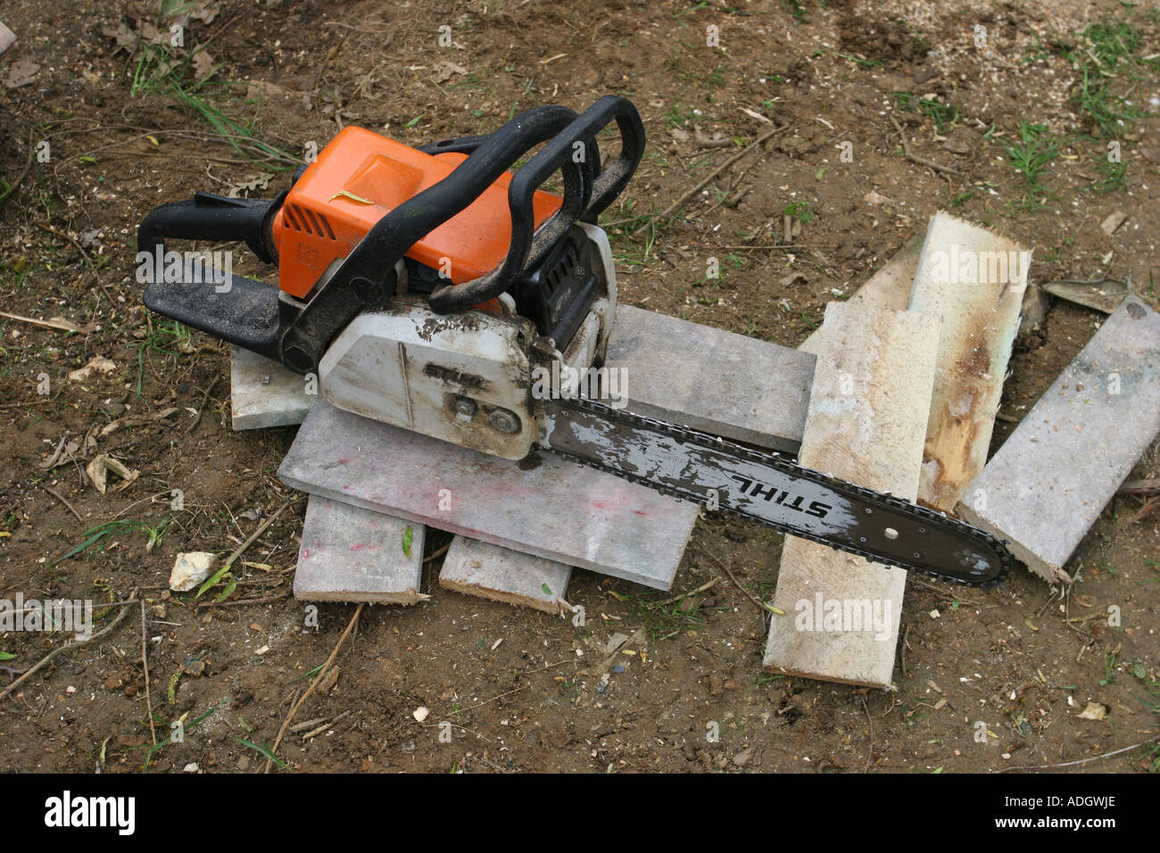 Chainsaw on the ground hi-res stock photography and images - Alamy