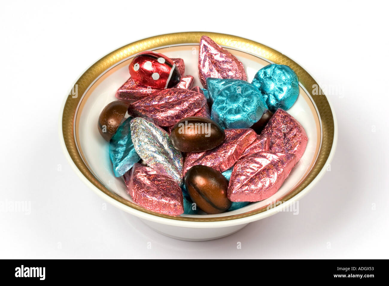 Foil wrapped chocolates Stock Photo - Alamy