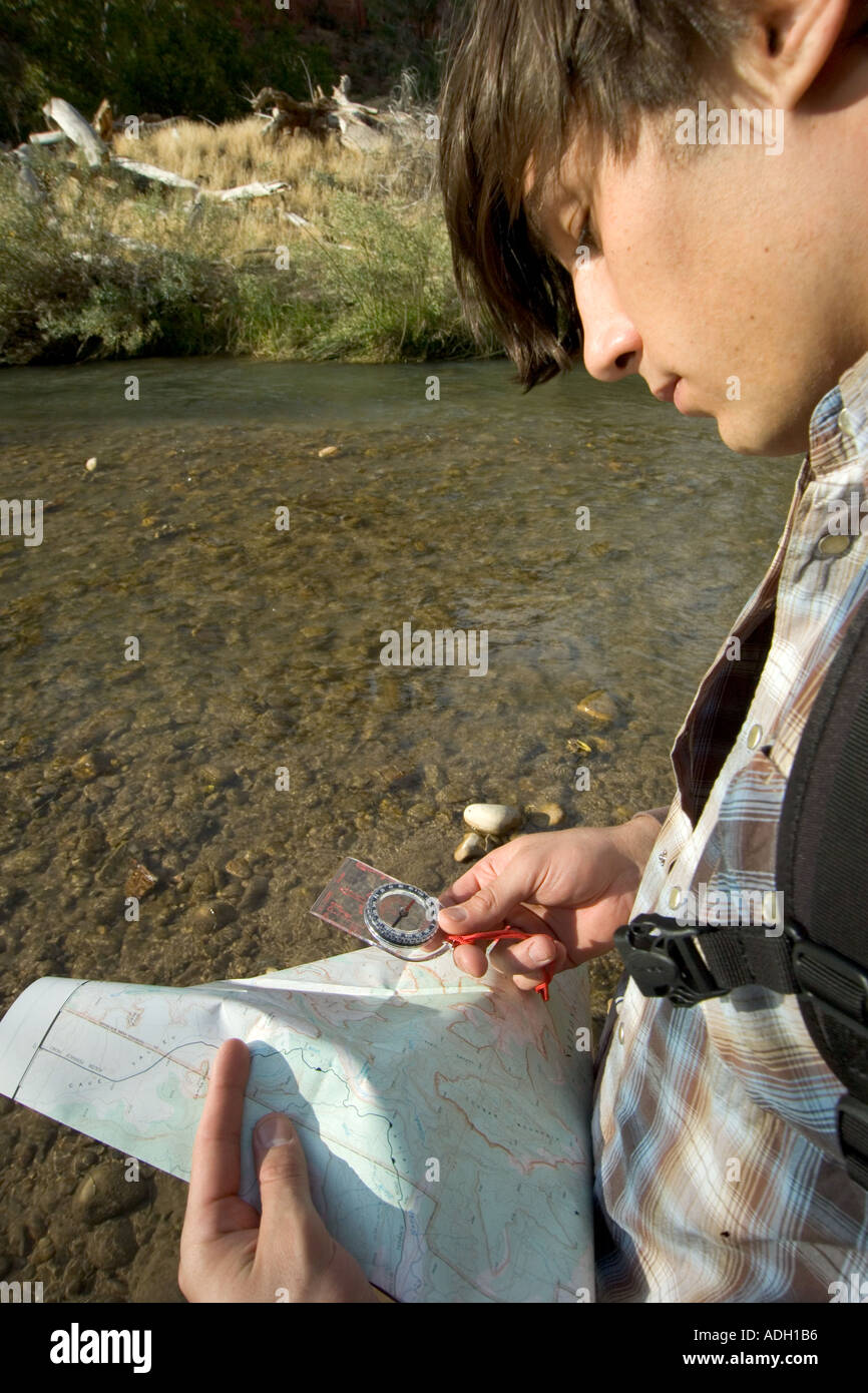 Hiker checking his map Stock Photo - Alamy