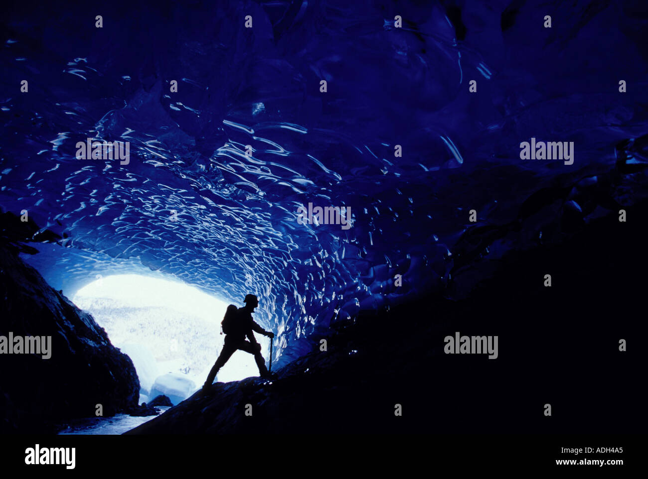Man Exploring Ice Cave Mendenhall Glacier SE Alaksa Stock Photo - Alamy