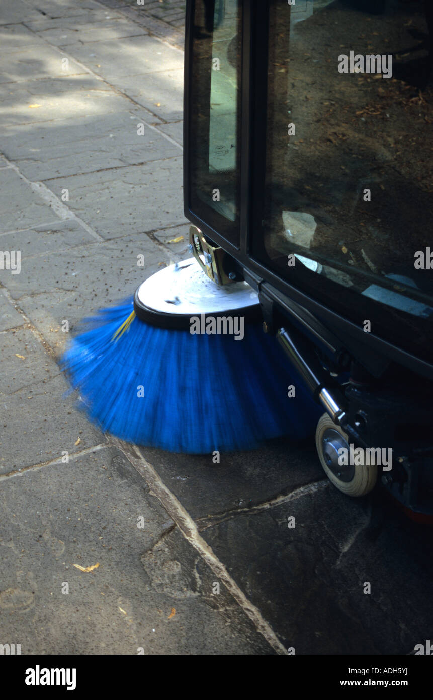 Road Sweeping Vehicle Cleaning The Pavement Stock Photo - Alamy