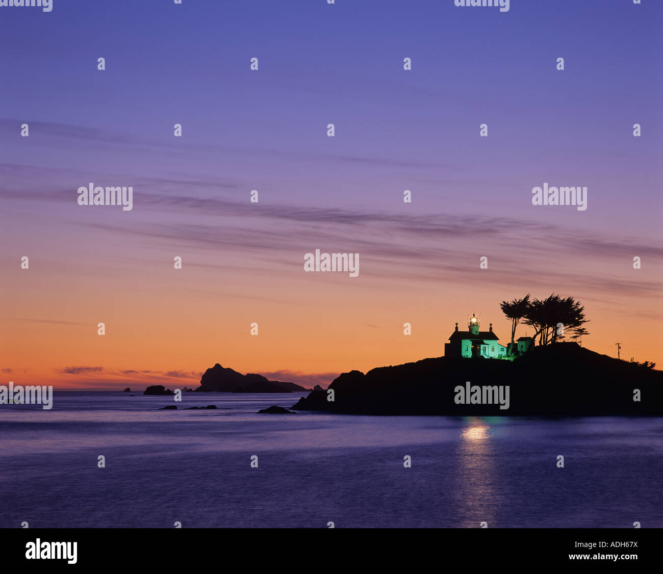 Battery Point Lighthouse at sunset along the Northern California ...