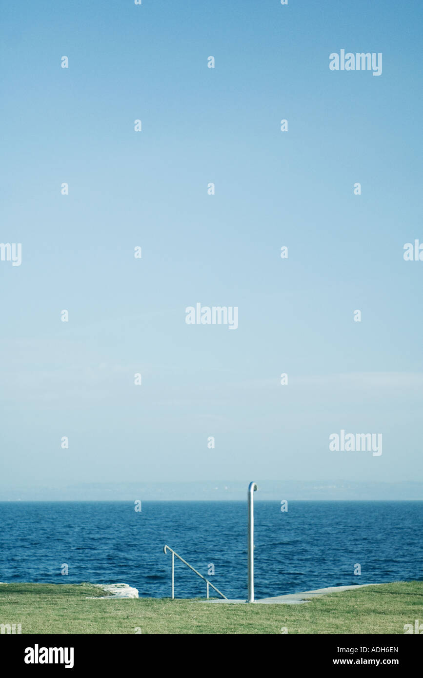 Steps leading to body of water Stock Photo - Alamy