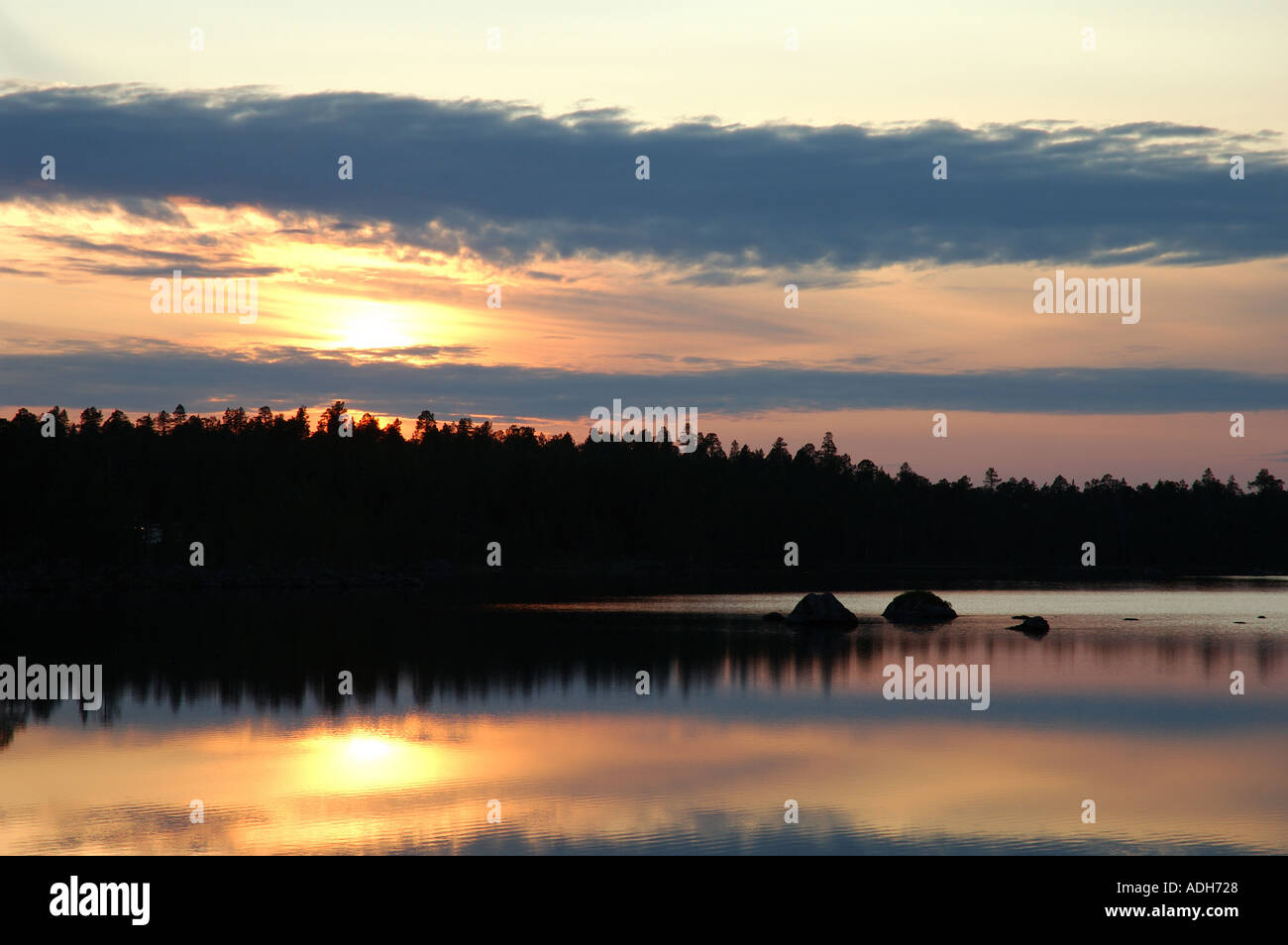 Finland Sunset over lake Inari Lapland Stock Photo - Alamy