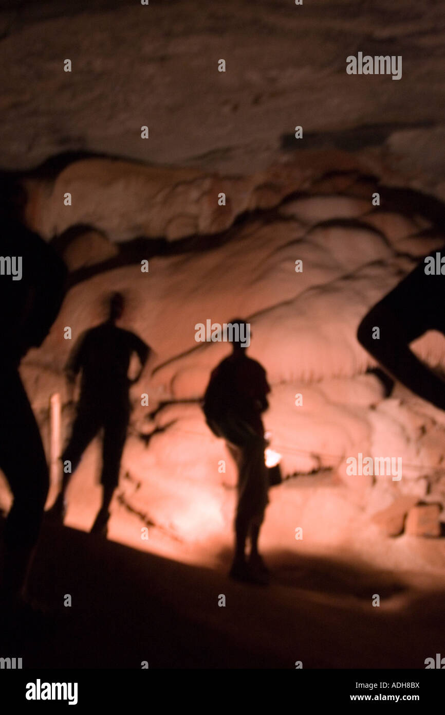 Tourist's Shadows on Cave Wall Stock Photo - Alamy