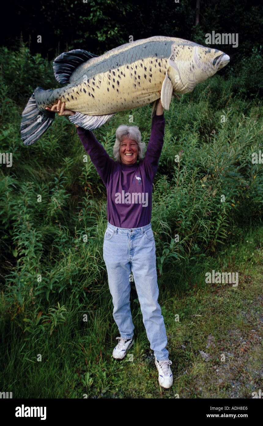 Woman Holding Stuffed Animal Fishing Catch Anchorage AK Stock Photo - Alamy