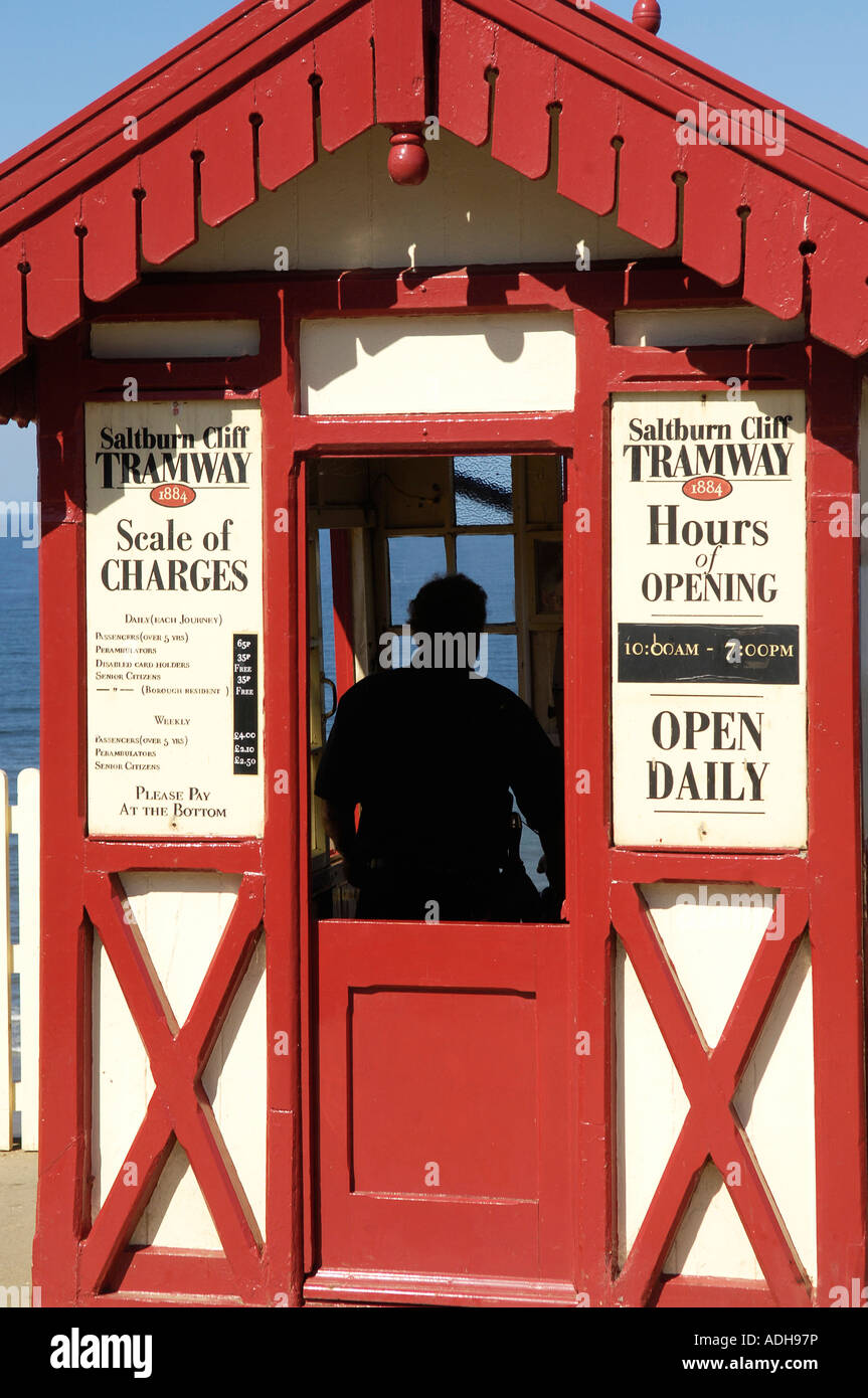 Ticket collector in his small office on the Saltburn Cliff Tramway ...