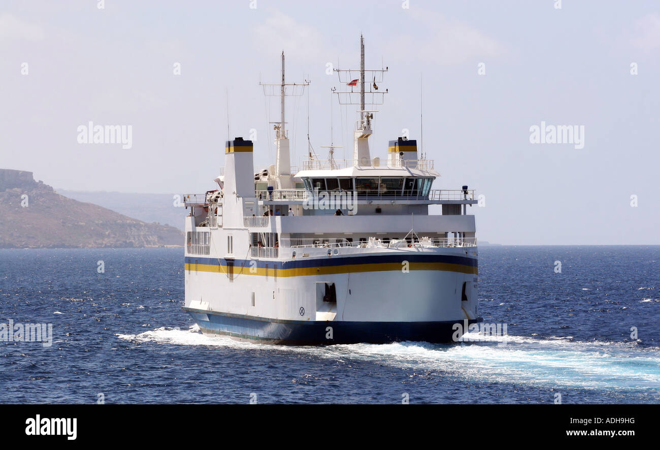 Passenger ship carrying cargo vehicles between the islands of Malta and ...