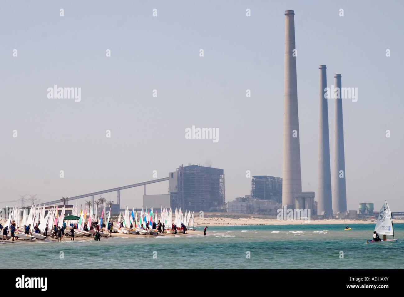 Stock Photo of Sailboats on Israeli Beach With Orot Rabin Electric ...