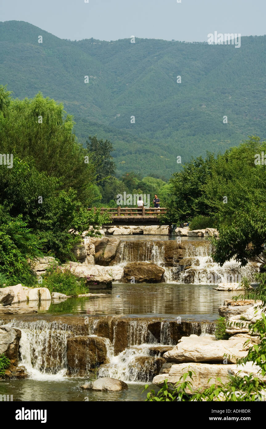 waterfall feature with Western Hills behind Beijing Botanical Gardens ...