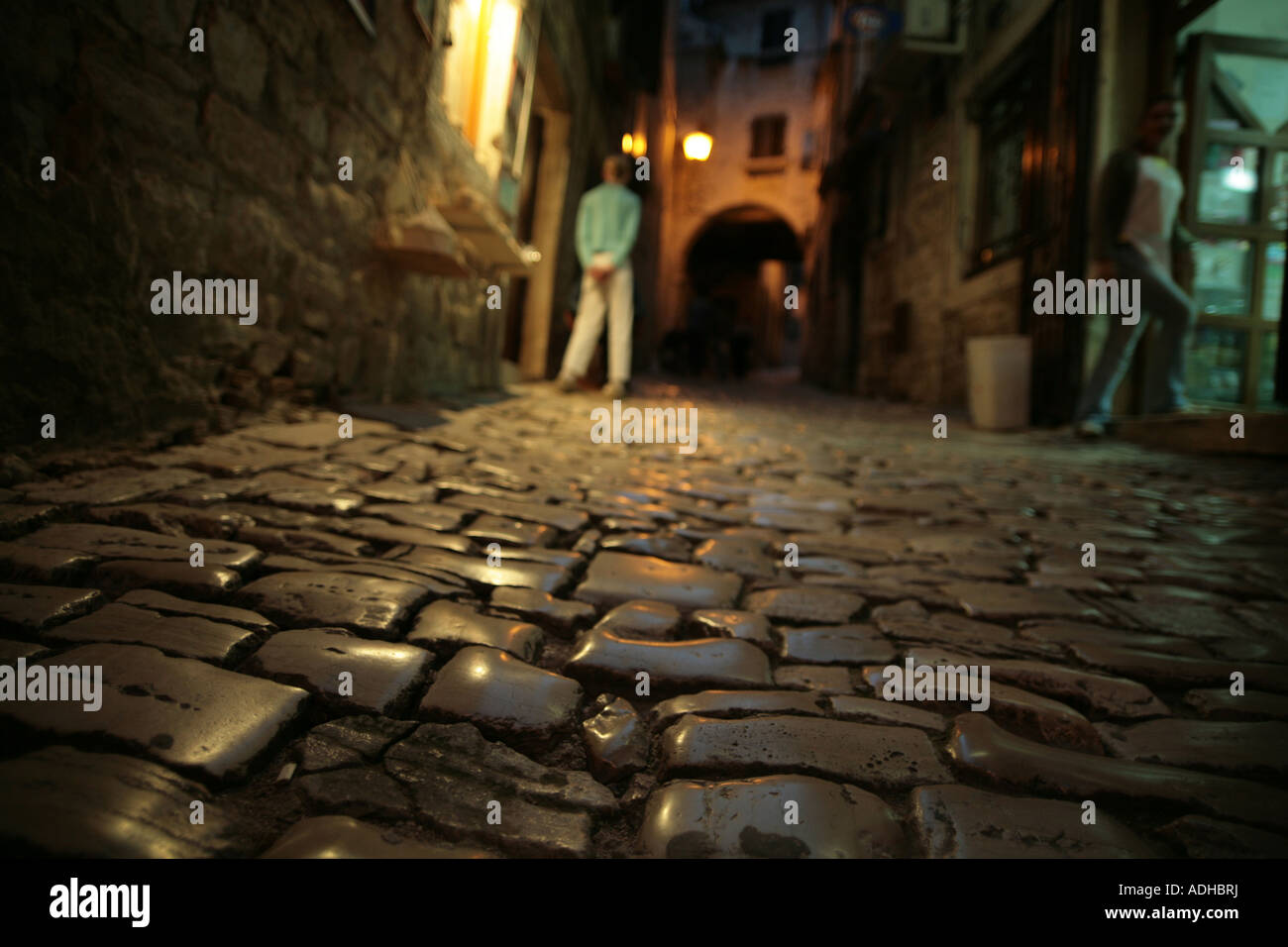 Shiny worn cobble stones in Rovinj street Stock Photo - Alamy