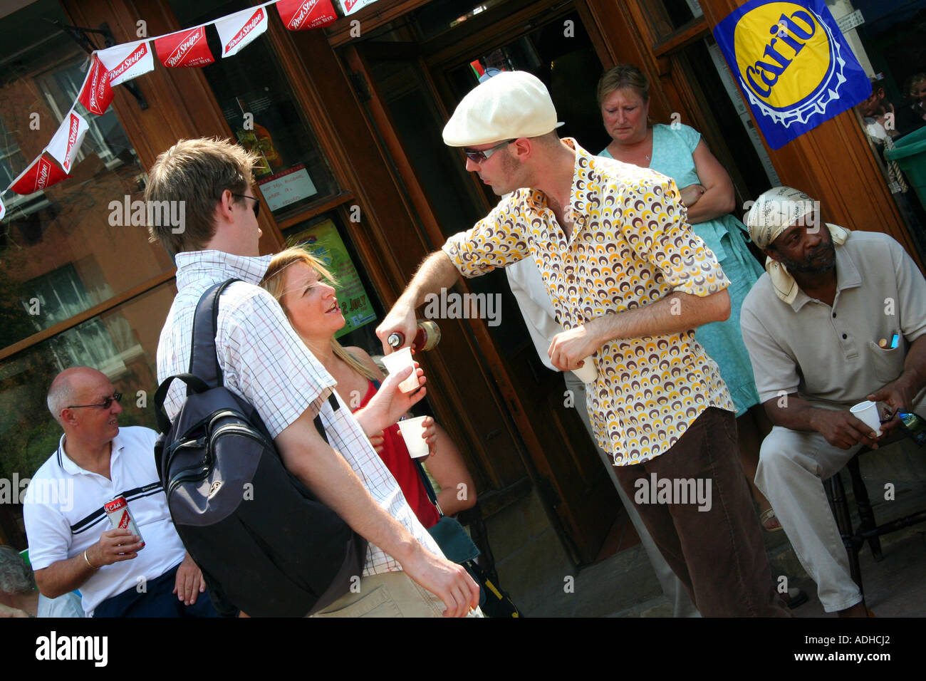 Handing out sunglasses hi-res stock photography and images - Alamy