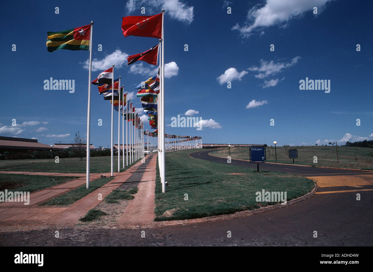 Flagpoles with national flags waving in breeze UNEP headquarters ...