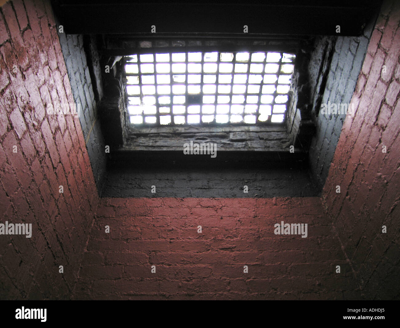 Pavement prism light in old tenement basement Stock Photo - Alamy