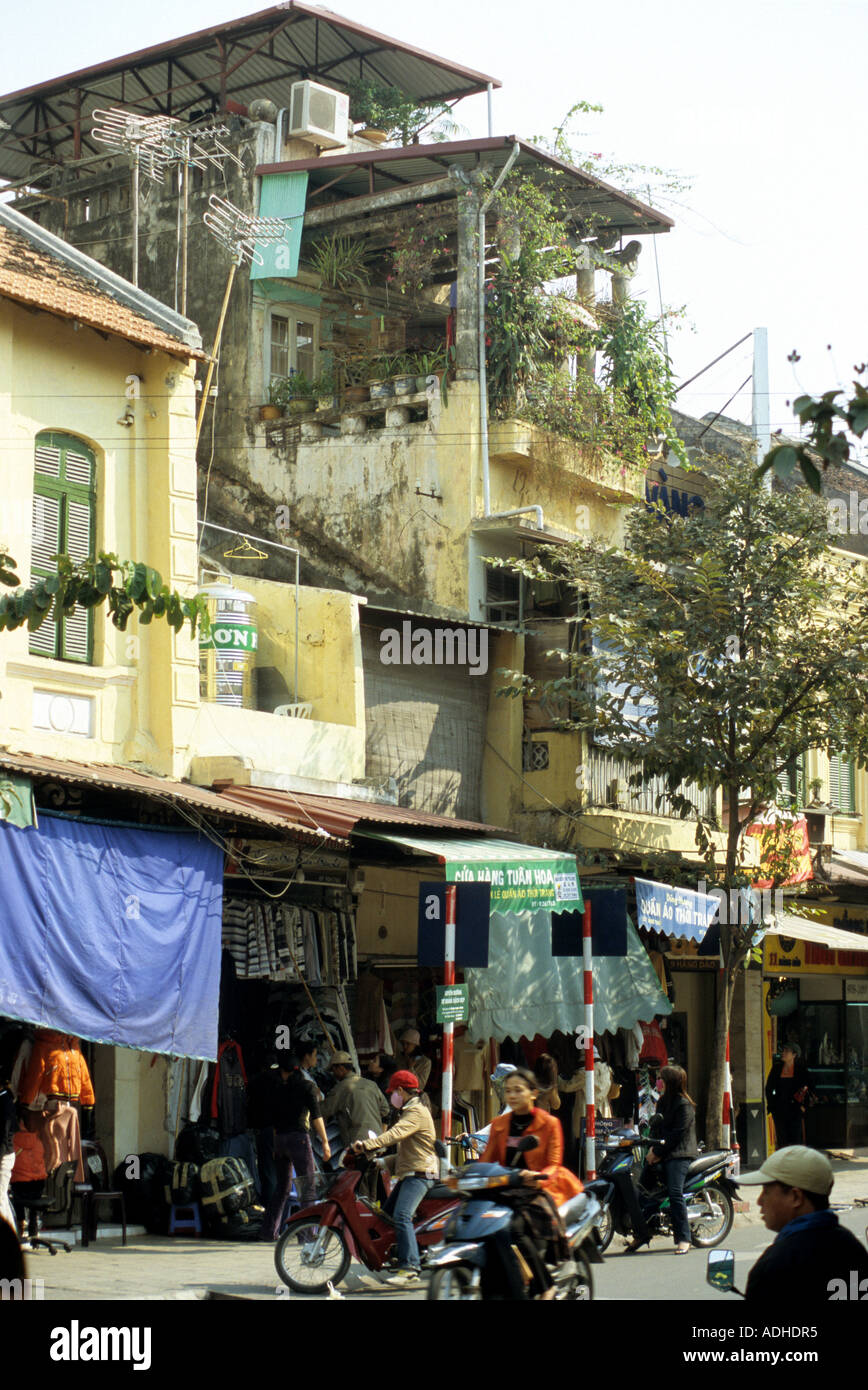 Busy street scene and shophouses on Hang Dao St, Hanoi Old Quarter ...