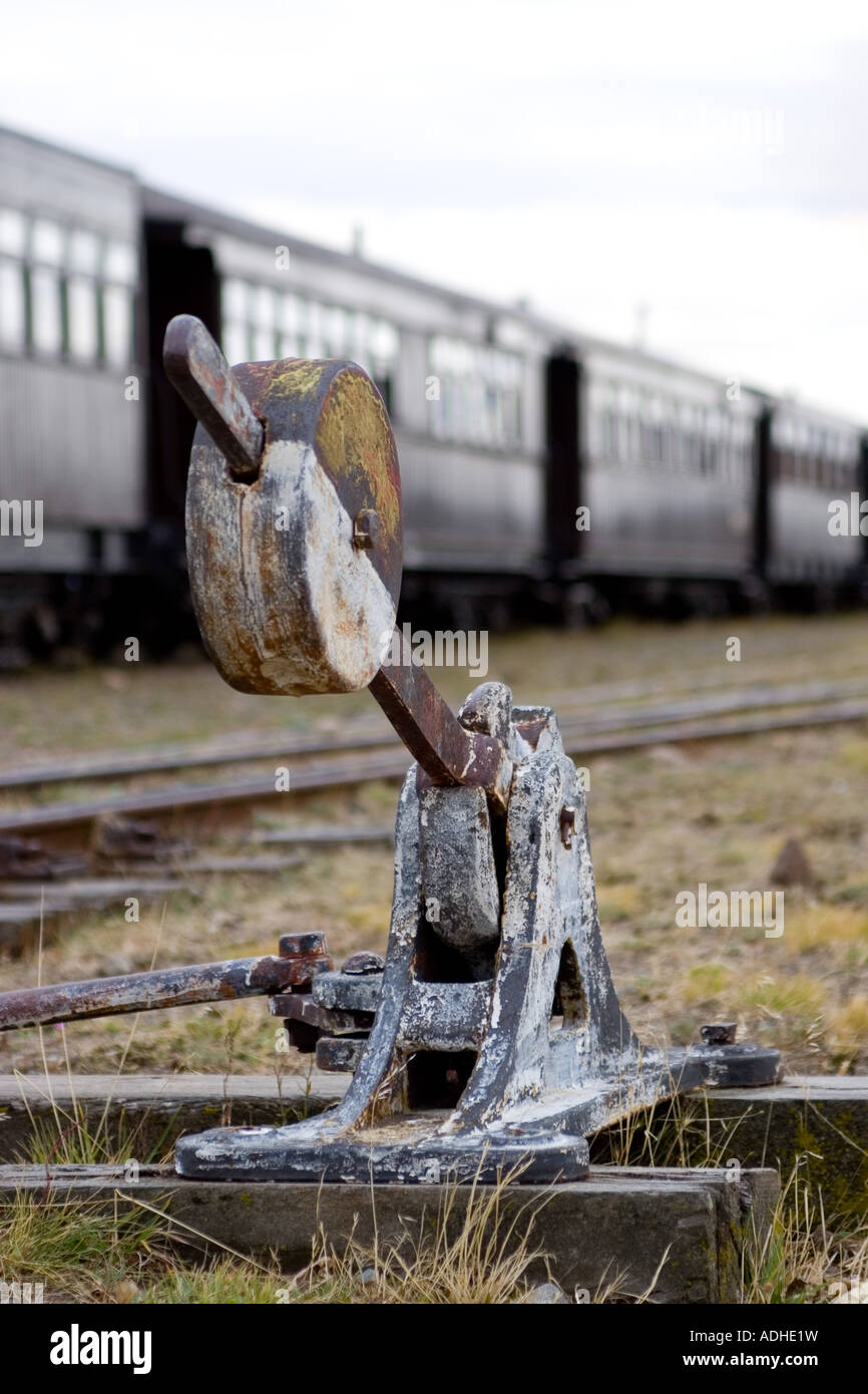 Detail of train rail changer with train in the background Stock Photo ...