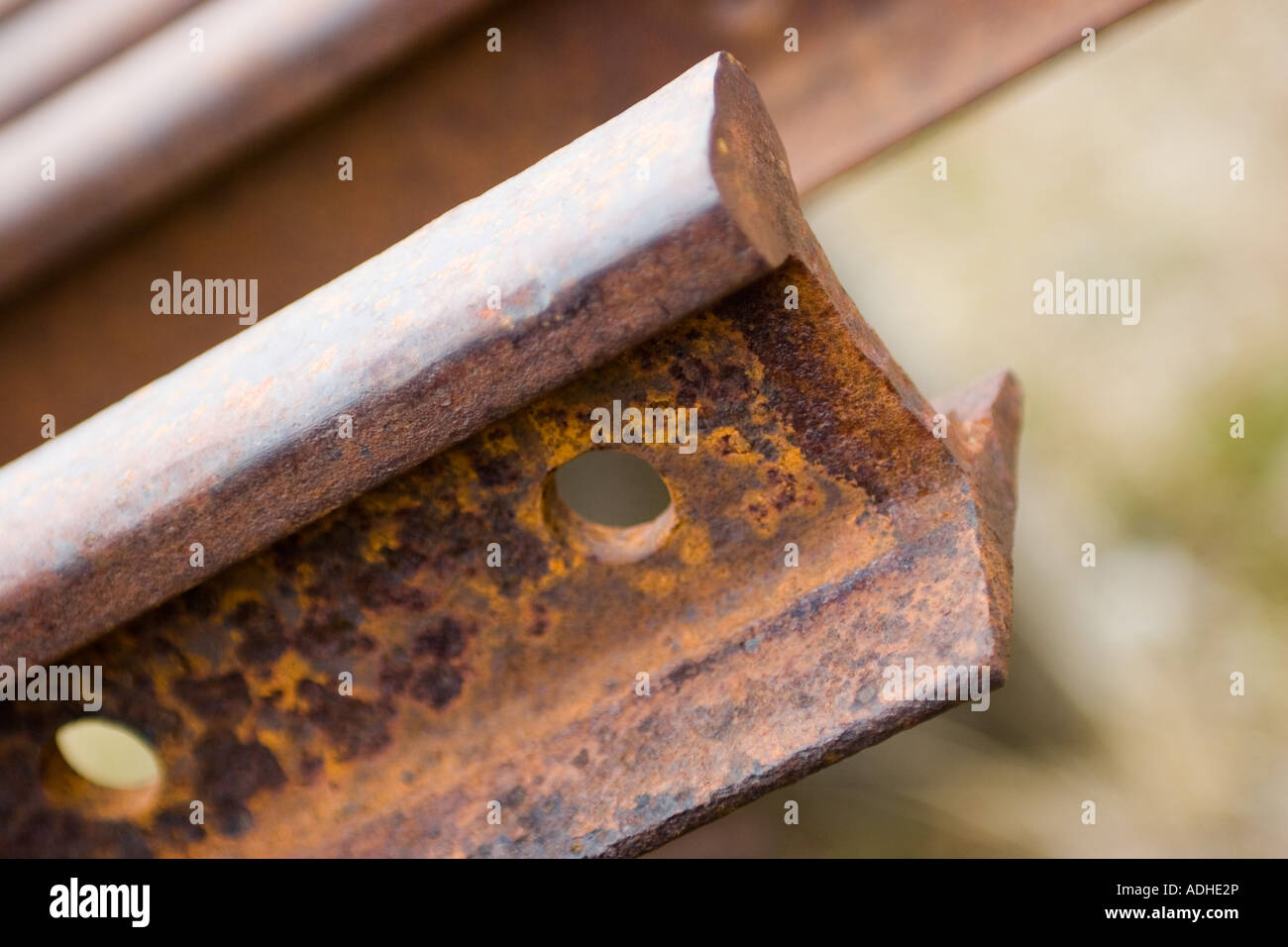 Closeup of an old rusty train rail Stock Photo - Alamy