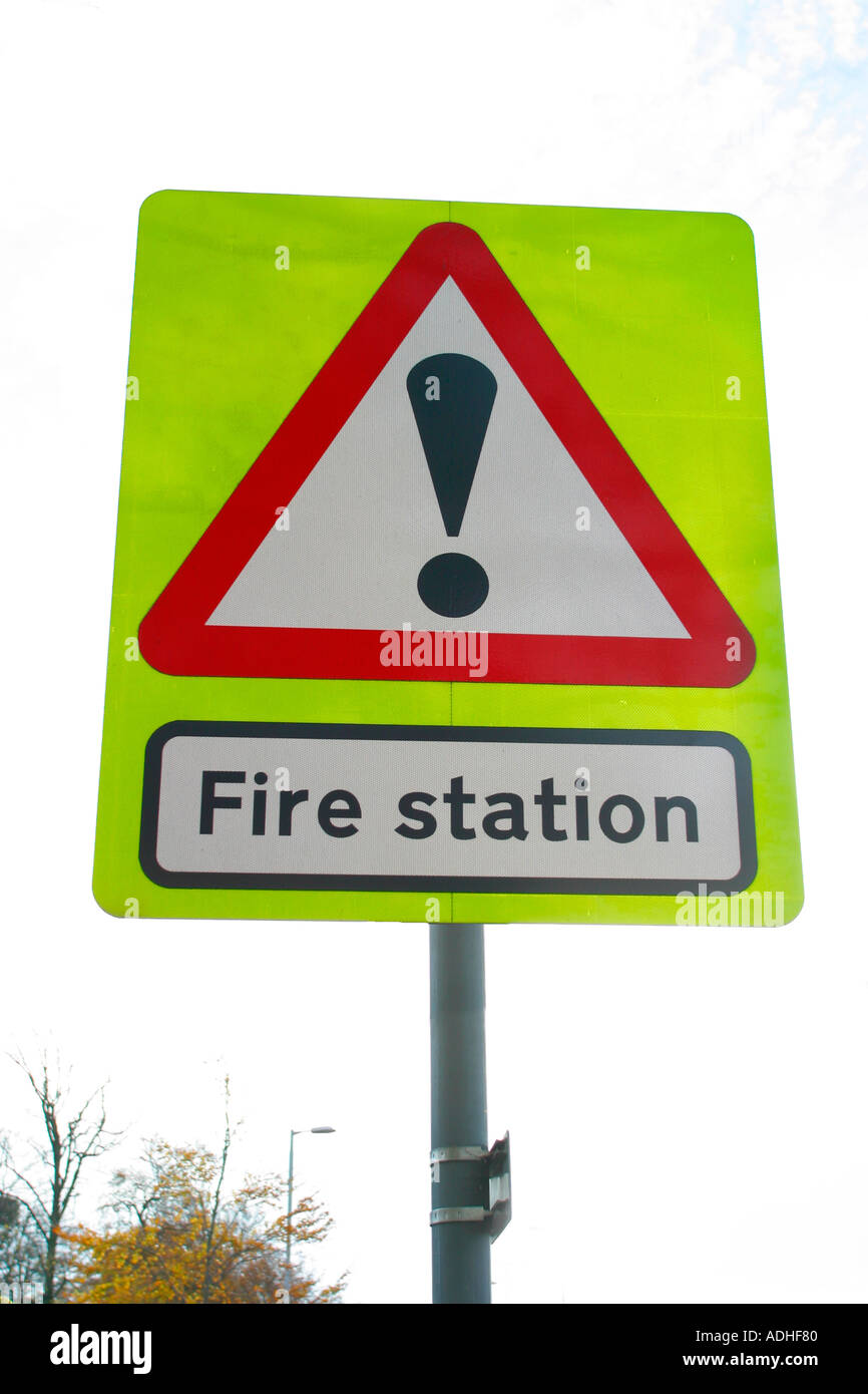 Caution sign at roadside approaching fire station Stock Photo - Alamy