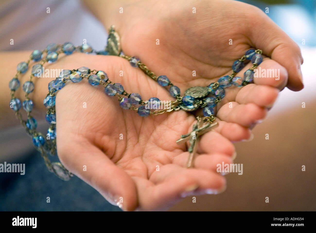 Close up rosary in hands hi-res stock photography and images - Alamy