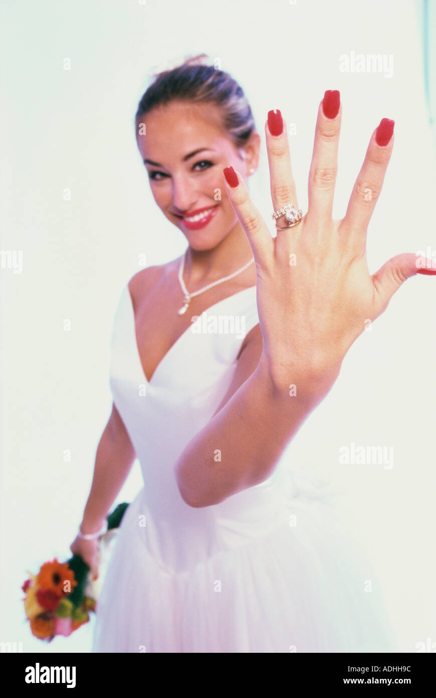 Woman showing off wedding ring hi-res stock photography and images - Alamy