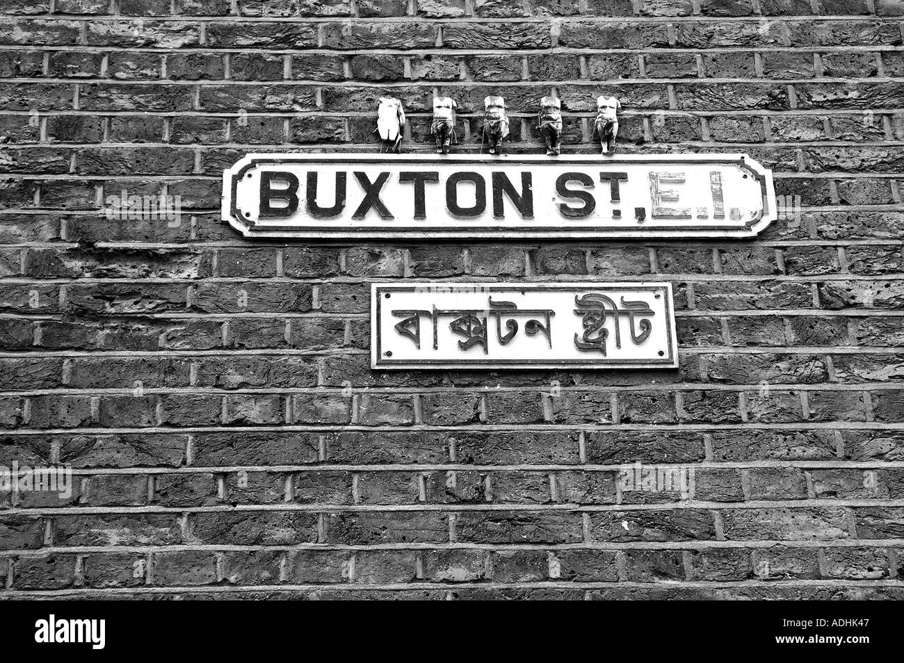 Mixed cultural signs for raod names Stock Photo - Alamy