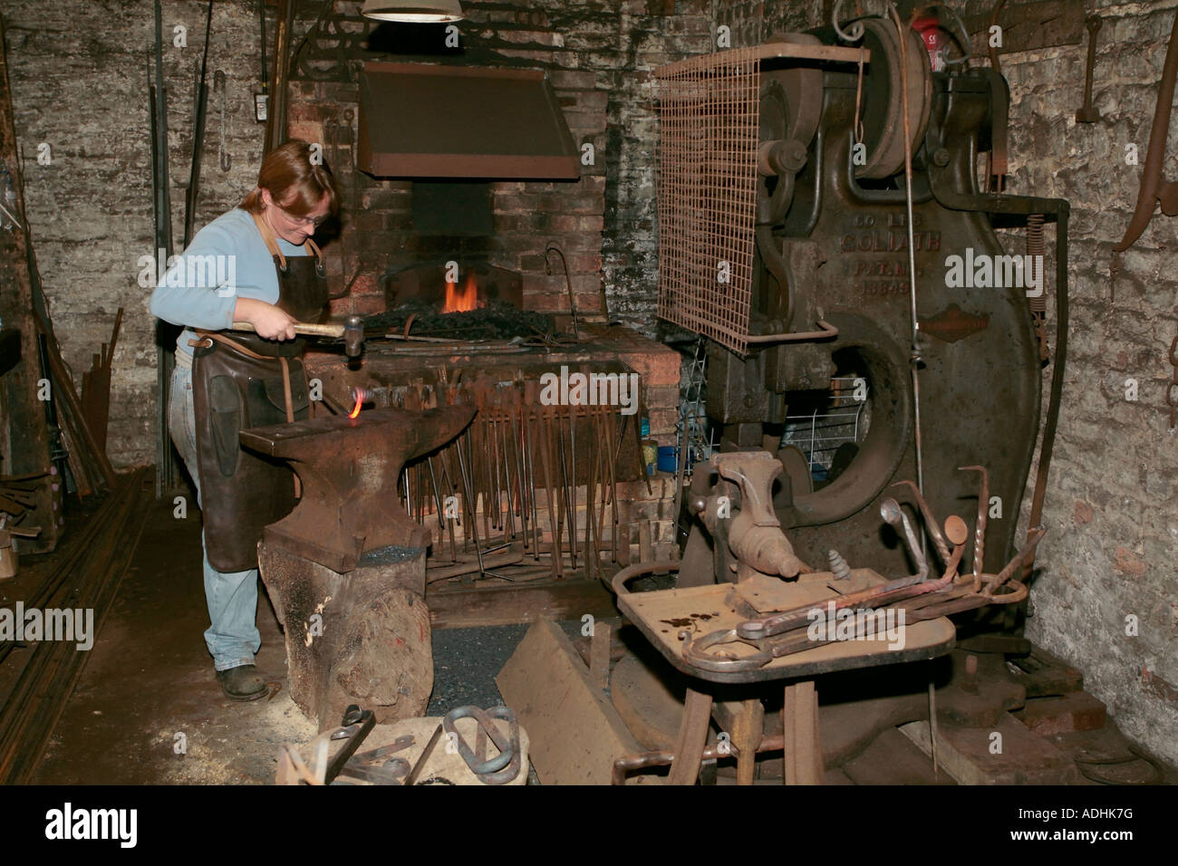 Female Blacksmith Working Forge Stock Photos & Female Blacksmith ...
