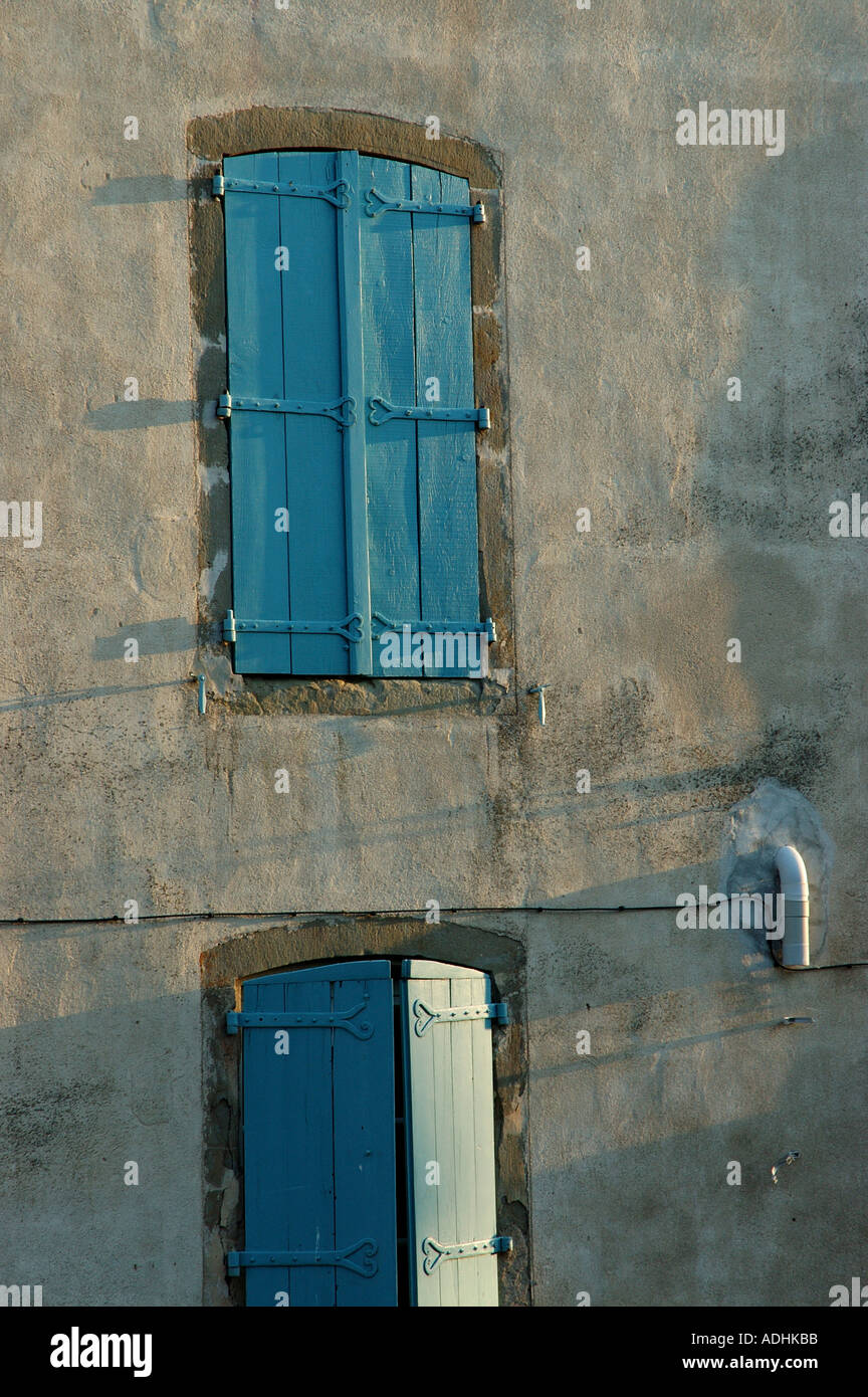 French shutters in a small french village Stock Photo - Alamy