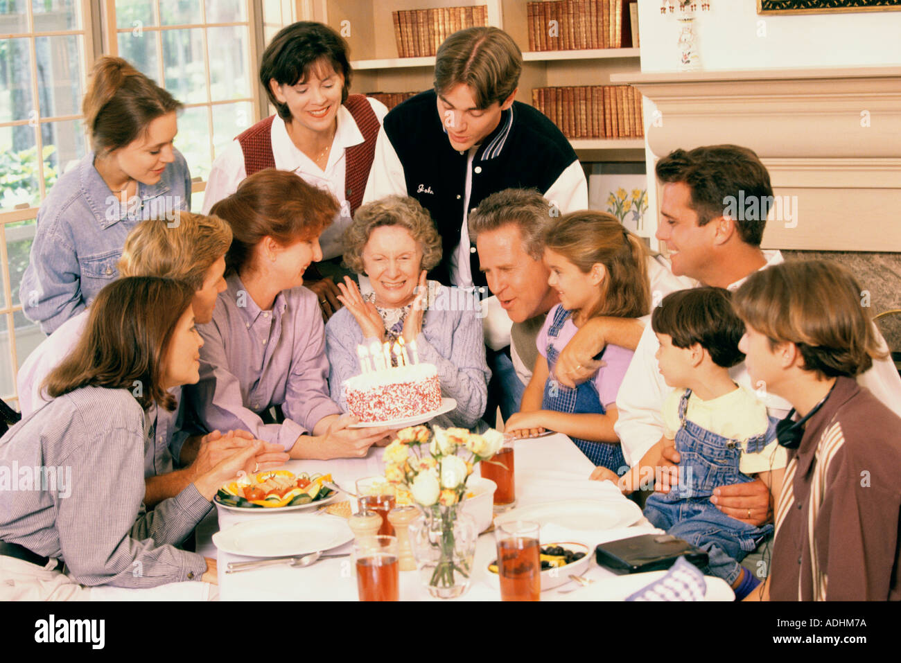 Family celebrating a birthday party Stock Photo - Alamy