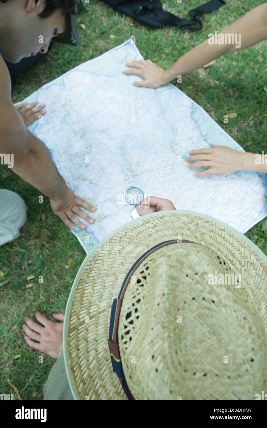 Two people reading compass hi-res stock photography and images - Alamy