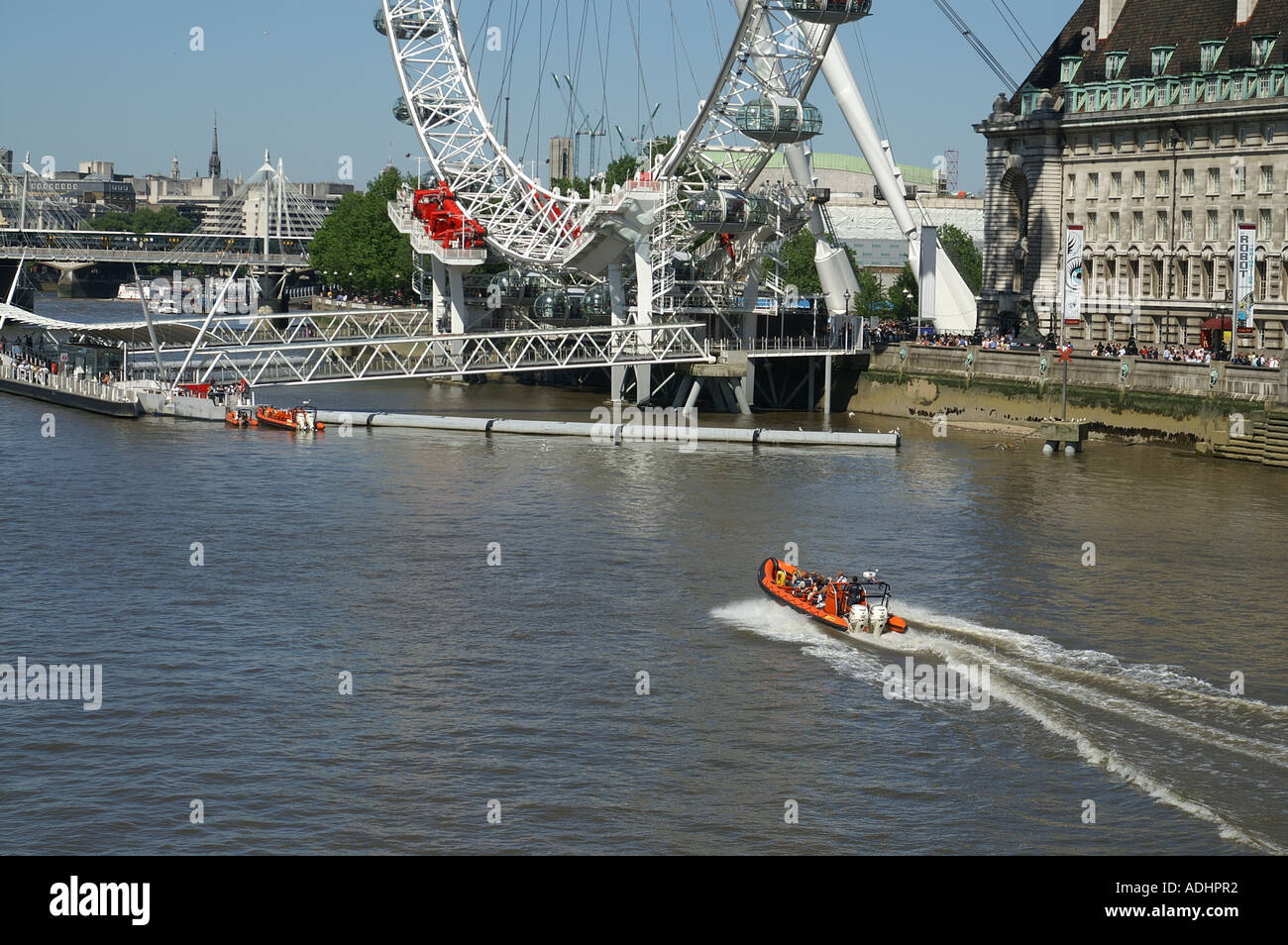 County Hall The Eye Embankment South bank walkway River Thames London ...