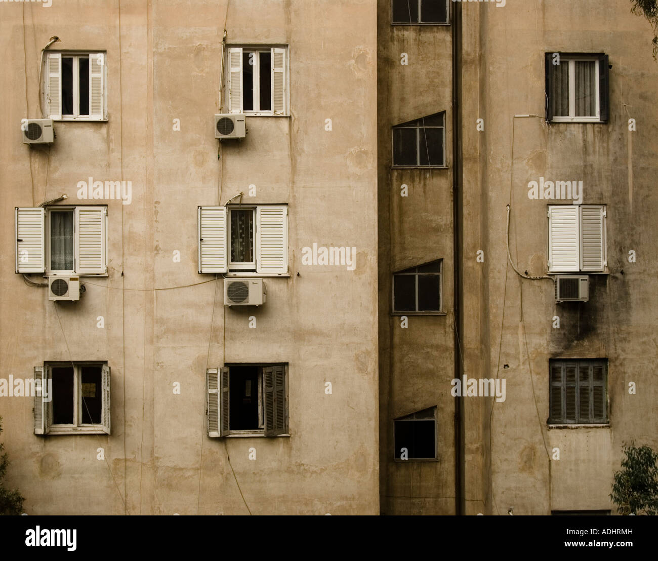Backside of dirty old post-war grey buildings in Athens Stock Photo - Alamy