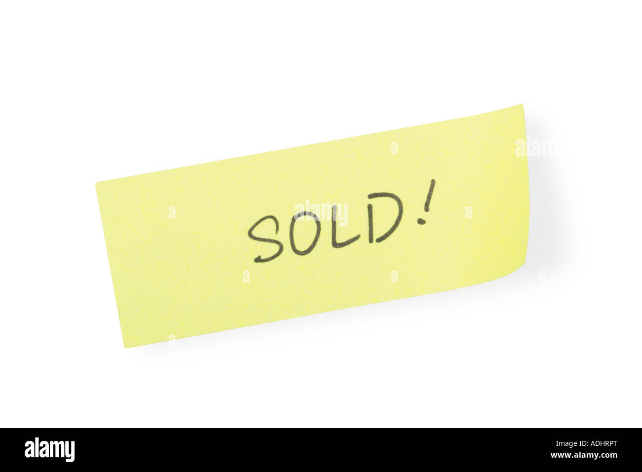 Yellow adhesive note sold Stock Photo - Alamy