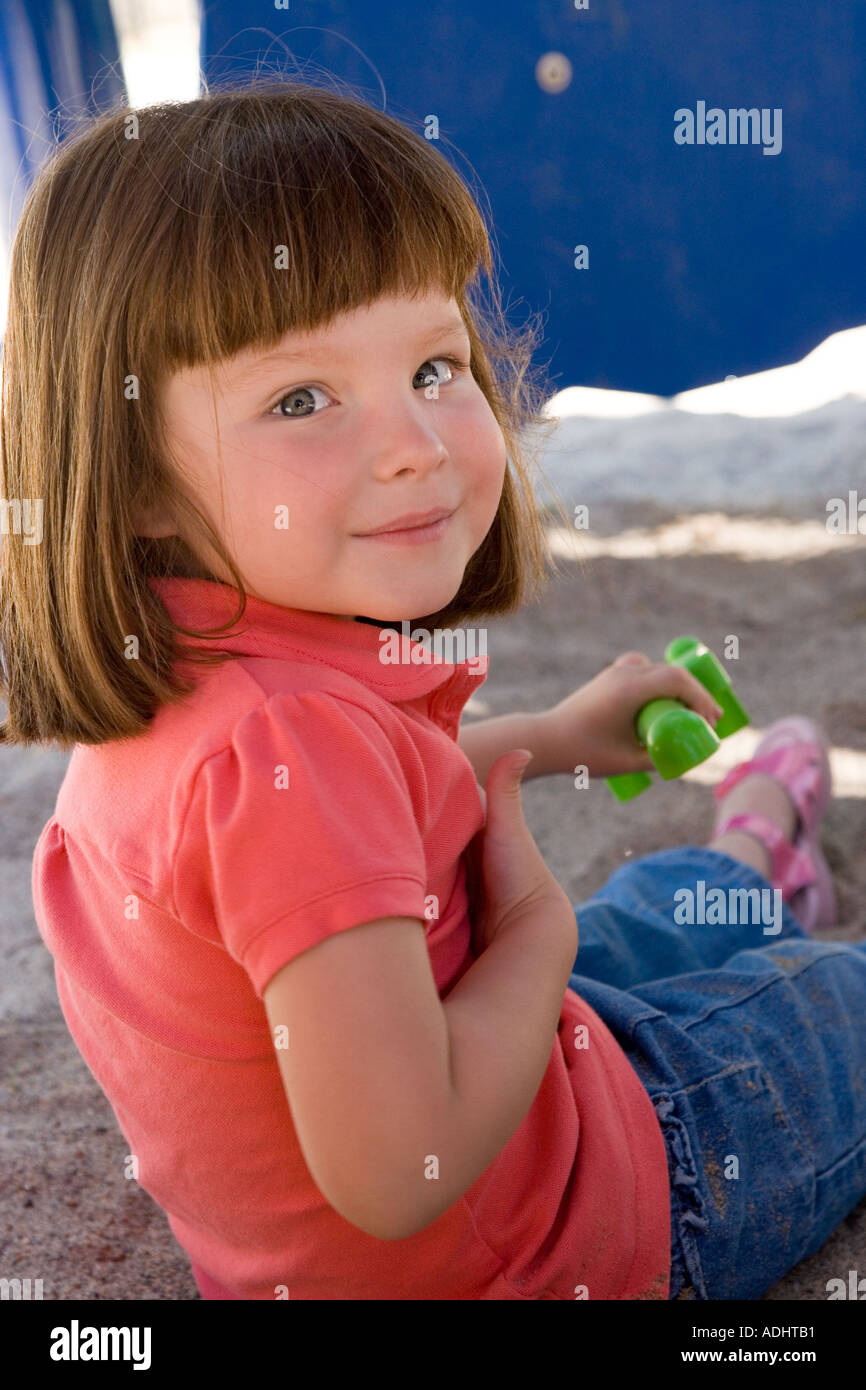 3 year old girl playing in sand hi-res stock photography and images - Alamy