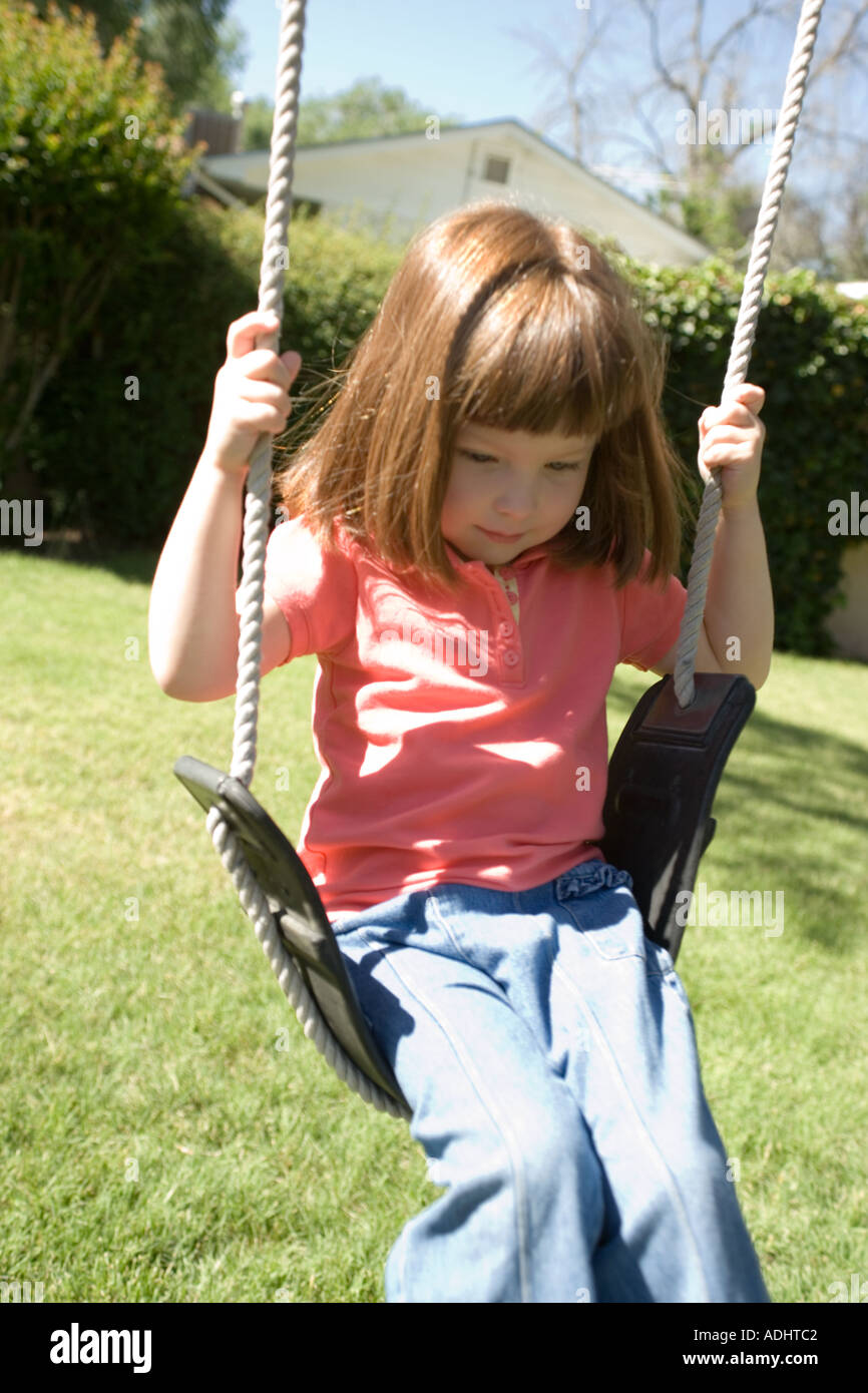 sad girl on swing Stock Photo - Alamy