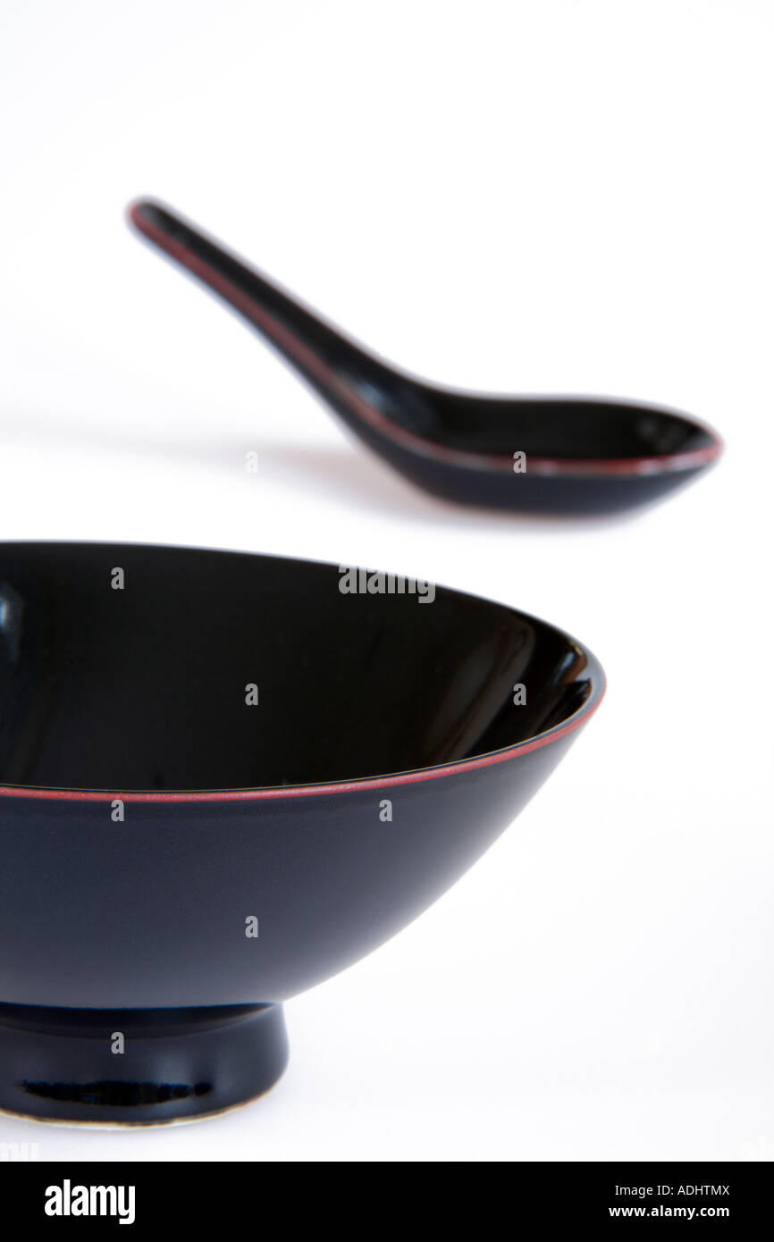 Empty black Japanese Chinese food bowl soup spoon Stock Photo - Alamy