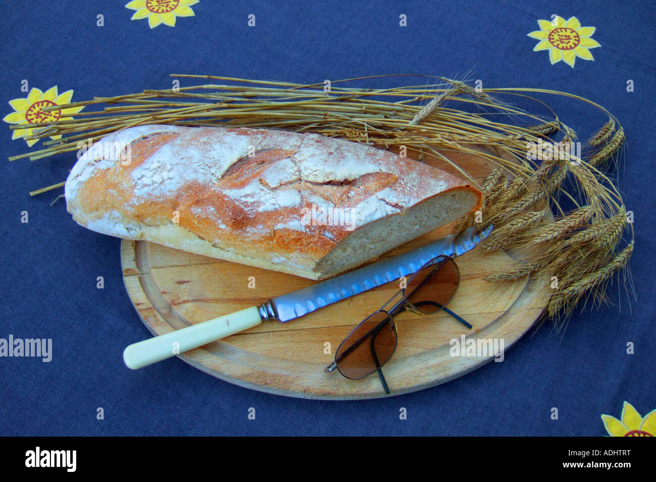 cut loaf of bread and barley Stock Photo - Alamy