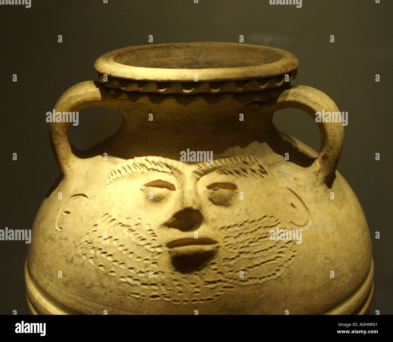 Roman Vase pot with facial expression Stock Photo - Alamy