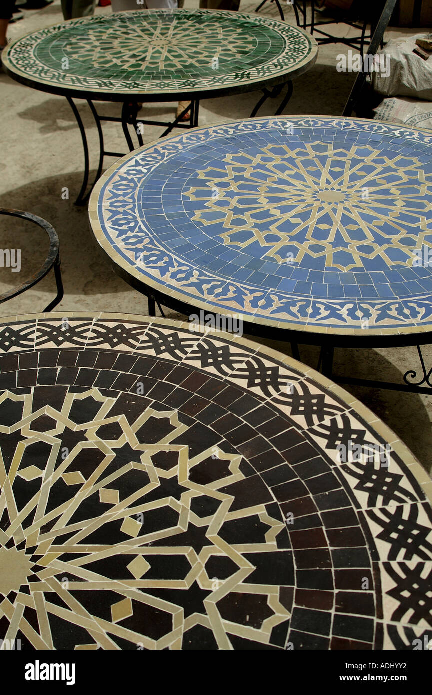 Mosaic decorated tables on display at the ceramic clay works in Fes ...