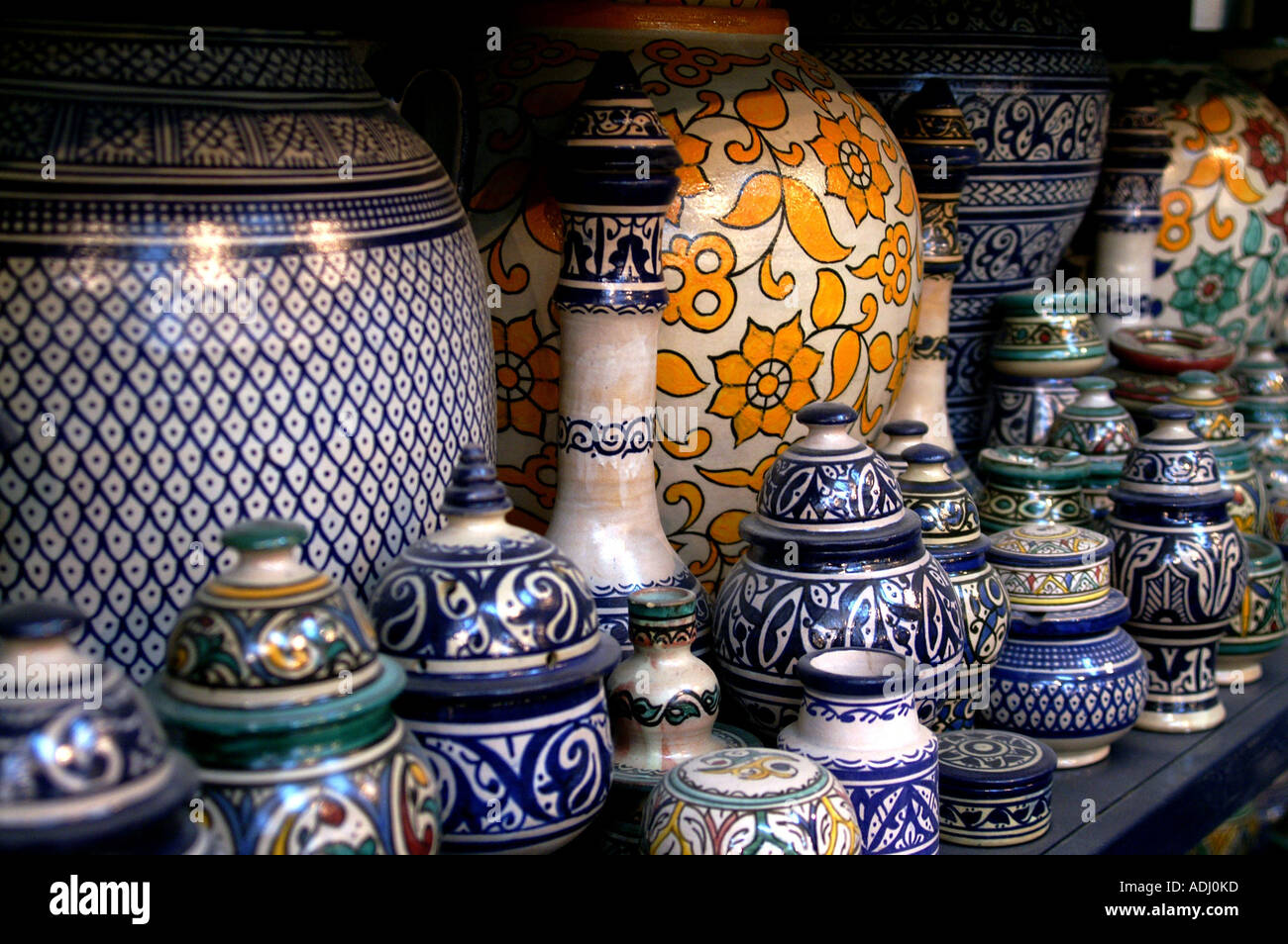 Hand painted decorated items on display at the ceramic clay works shop ...