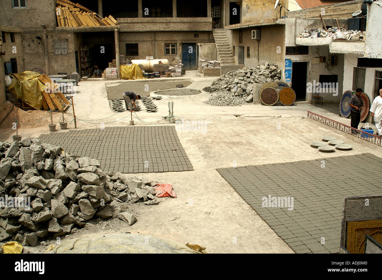 clay tiles baking in the sun at the ceramic clay works in Fes Morocco ...