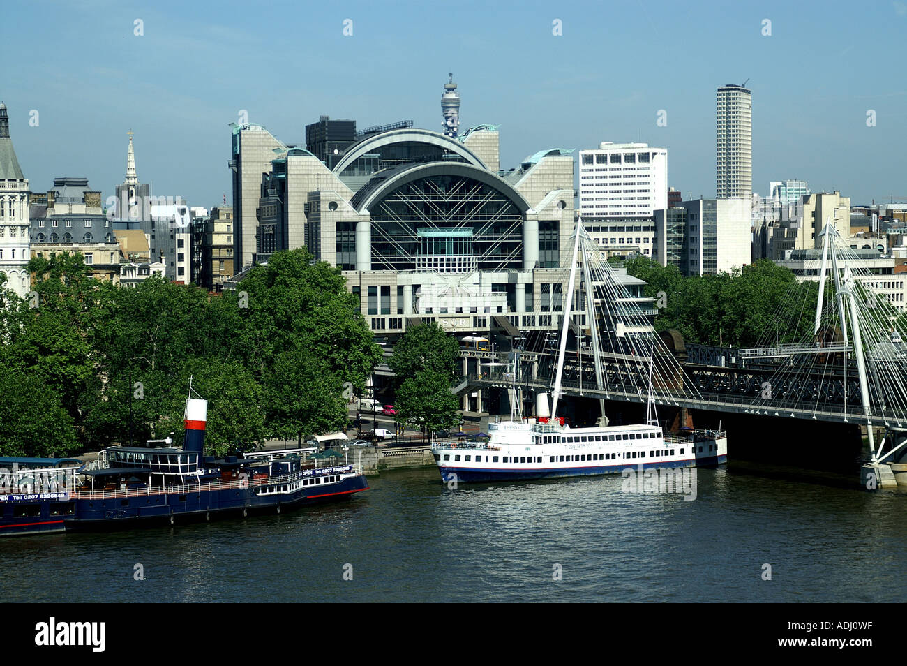 Charing Cross railway station Hungerford bridge river Thames London ...