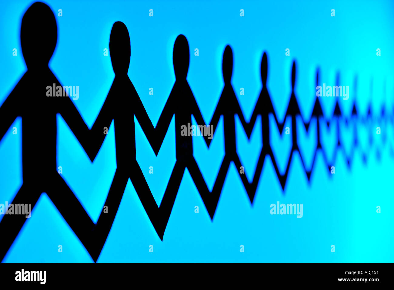 Paper chain people Stock Photo - Alamy