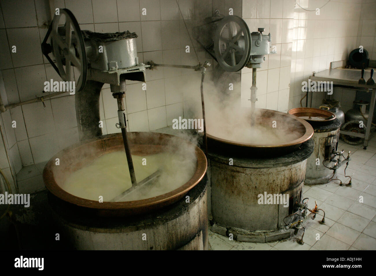 Turkish delight mixture being stirred by traditional machinery, Turkey ...