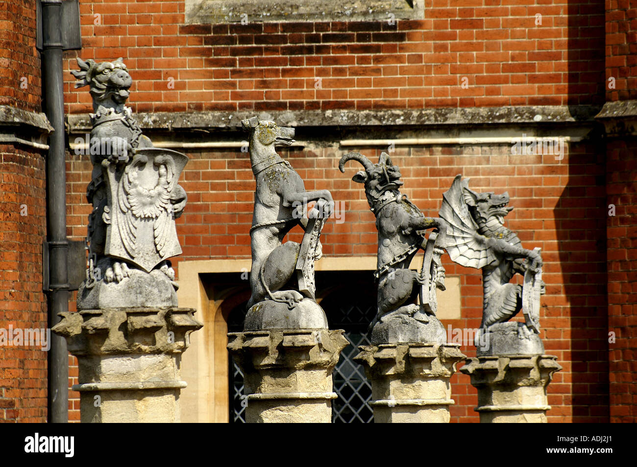 Statues by main entrance to Hampton Court London England Stock Photo ...