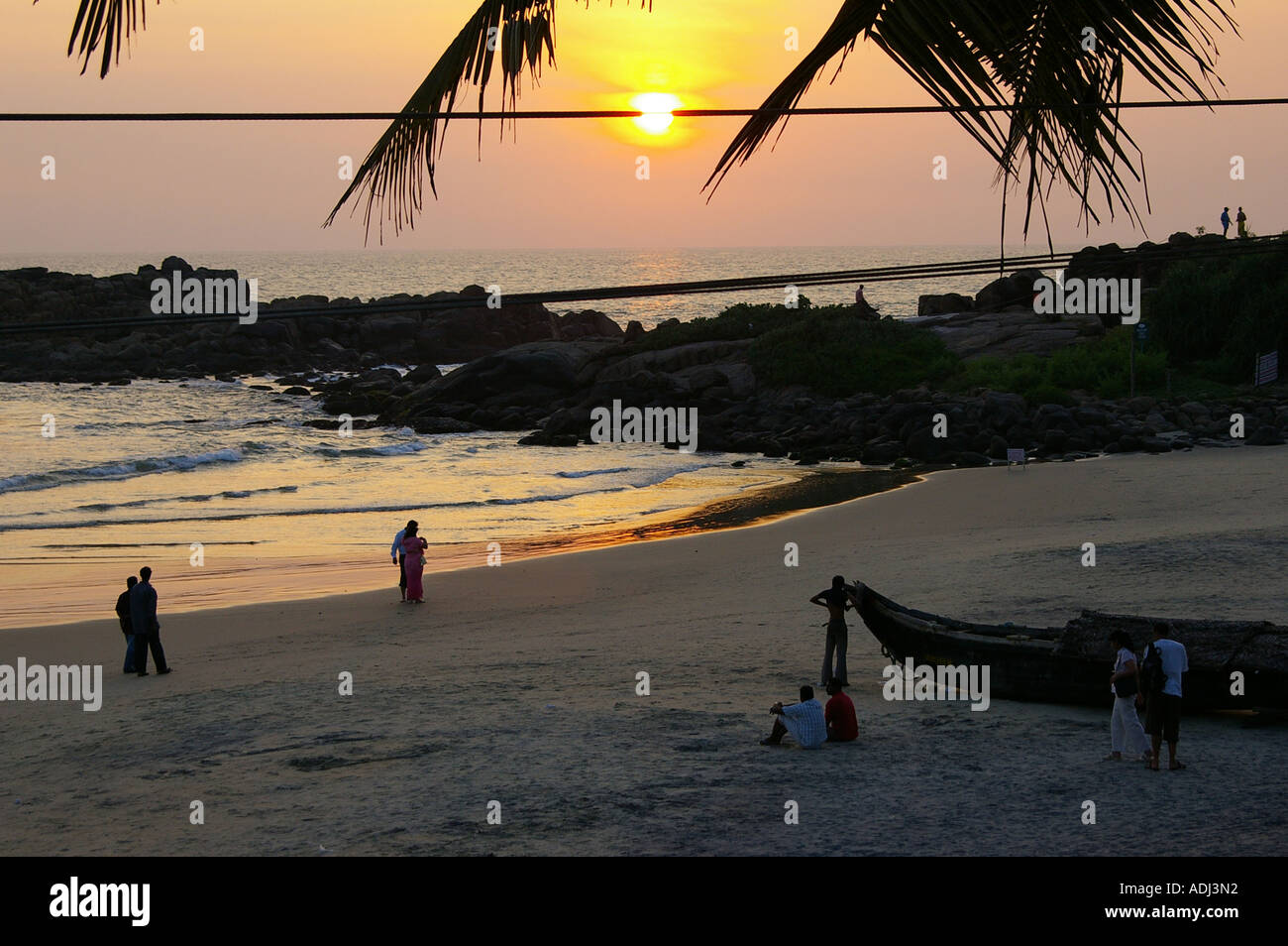Kovalam beach sunset Stock Photo - Alamy