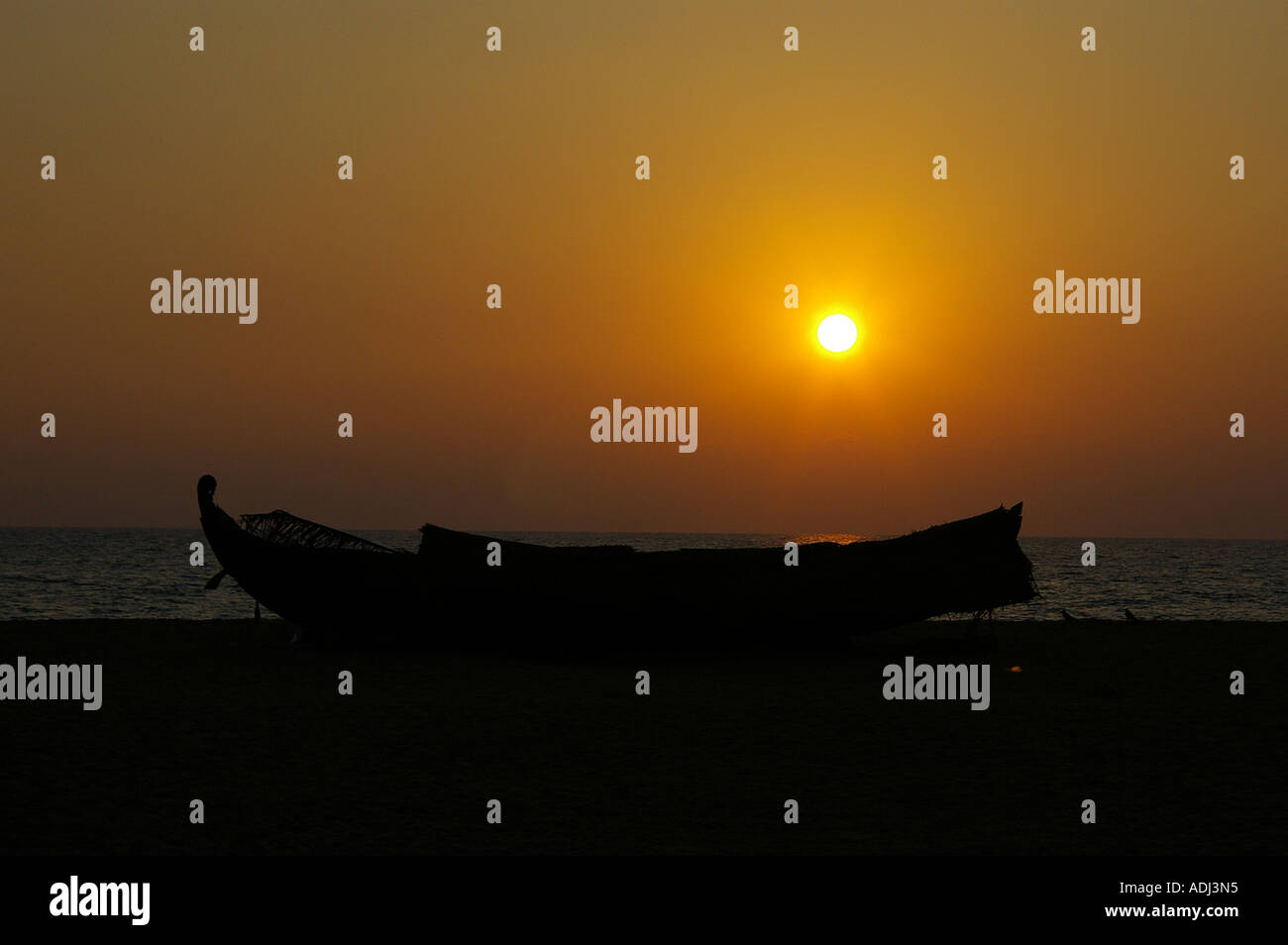 Beach sunset fishing boats Trivandrum Thiruvananthapuram Kerala India ...