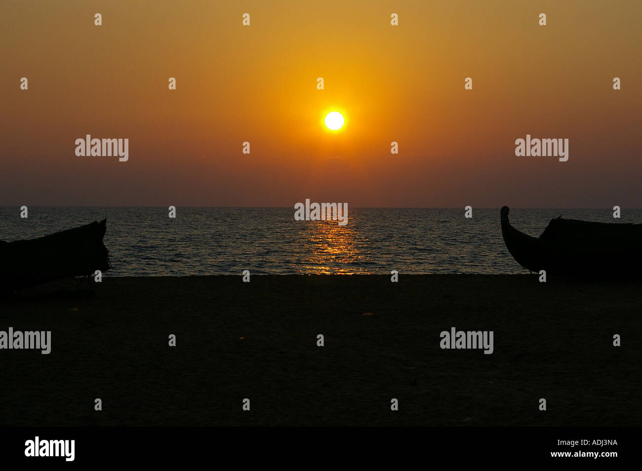 Beach sunset fishing boats Trivandrum Thiruvananthapuram Kerala Indian ...